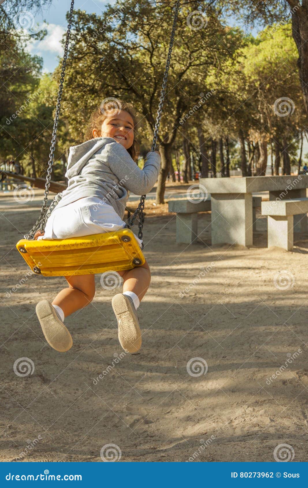 Rear View Girl Having Fun on Swing at the Playground Stock Photo ...