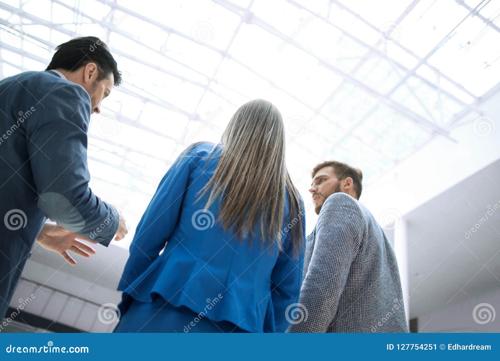 Rear View.a Group of Business Colleagues Standing in the Office Stock ...