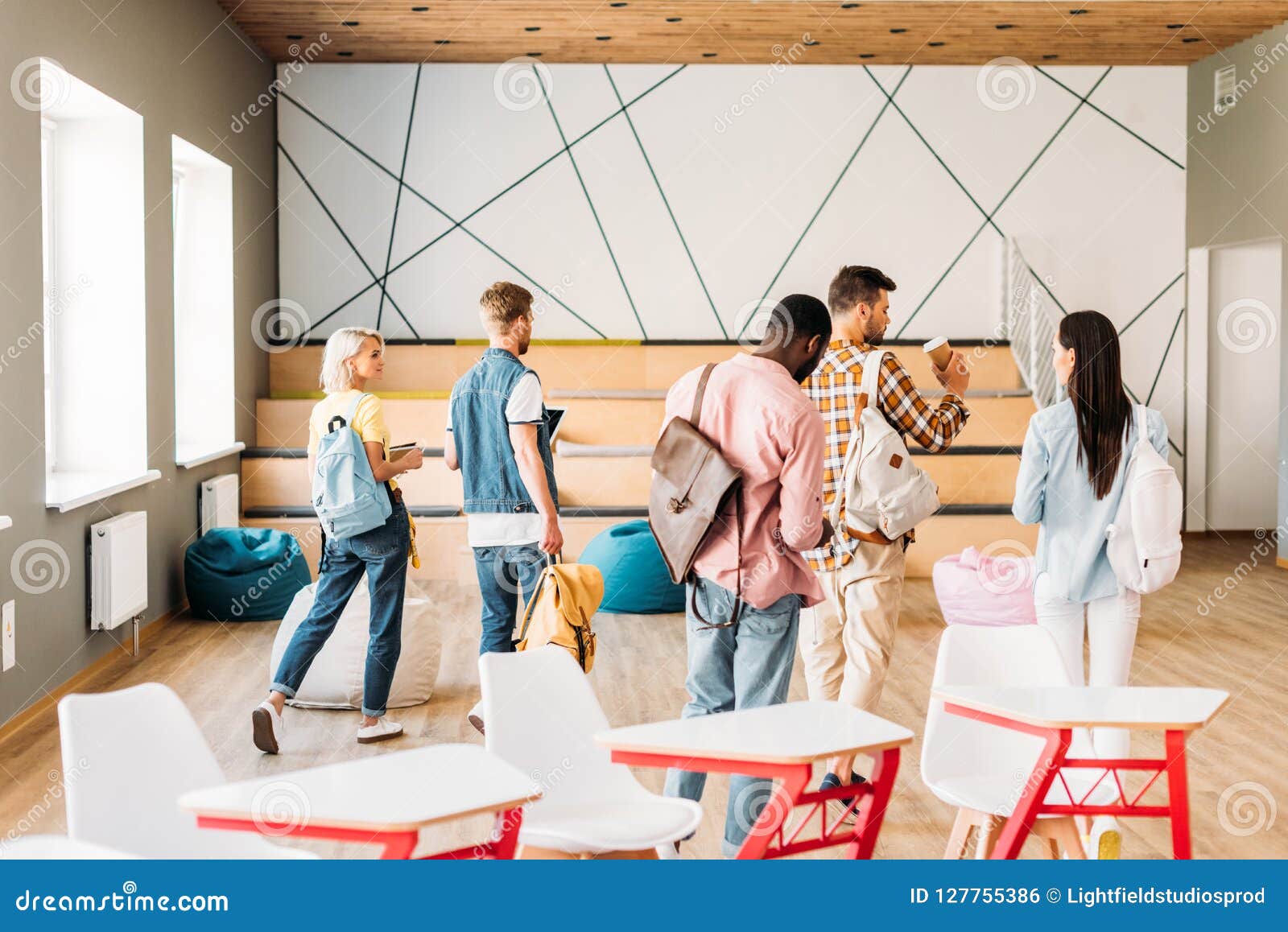 Rear View of Group of Young Students Going Out of Lecture Room Stock ...