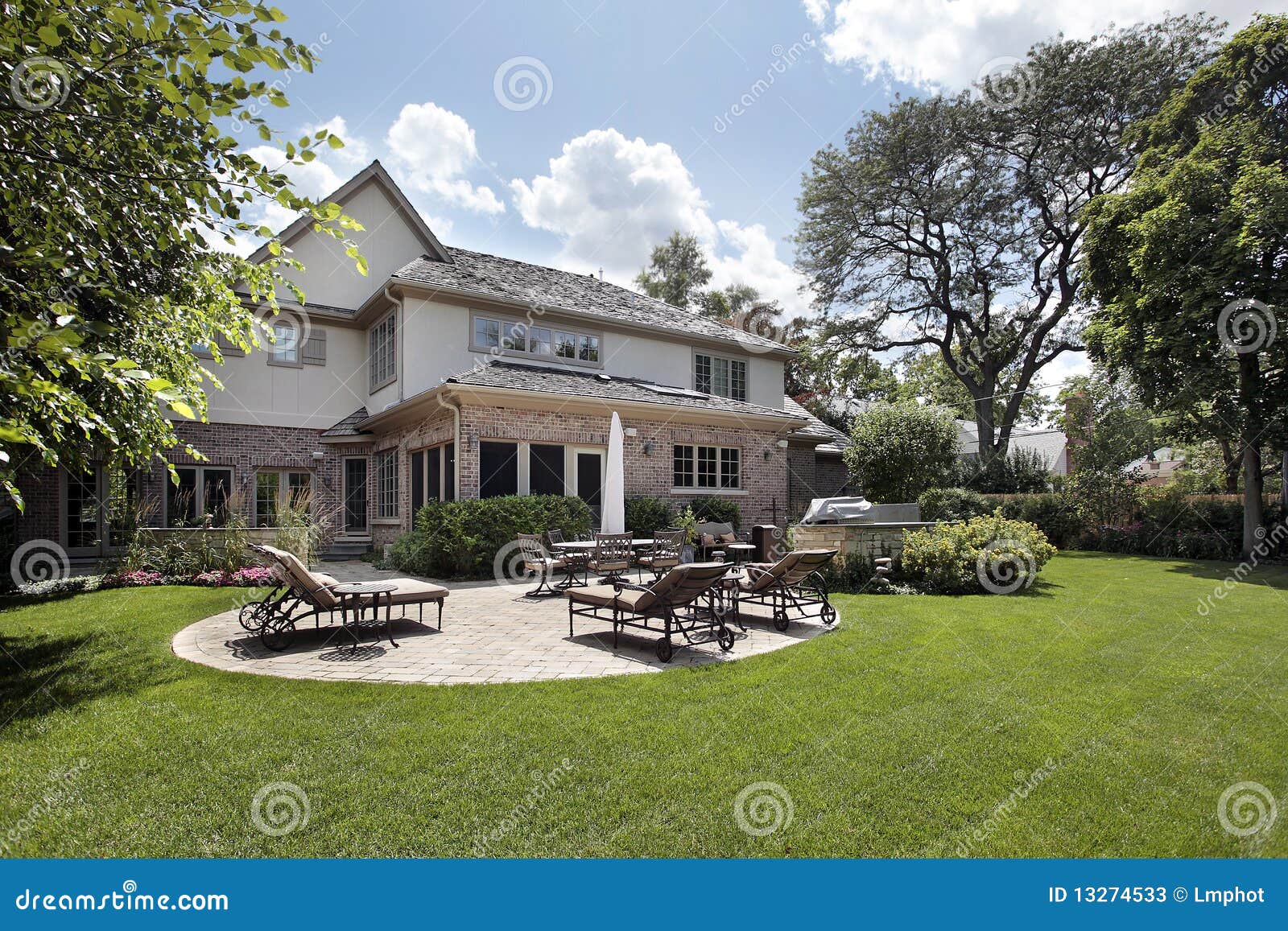 Rear View of Home with Patio and Grill Stock Image - Image of spacious ...