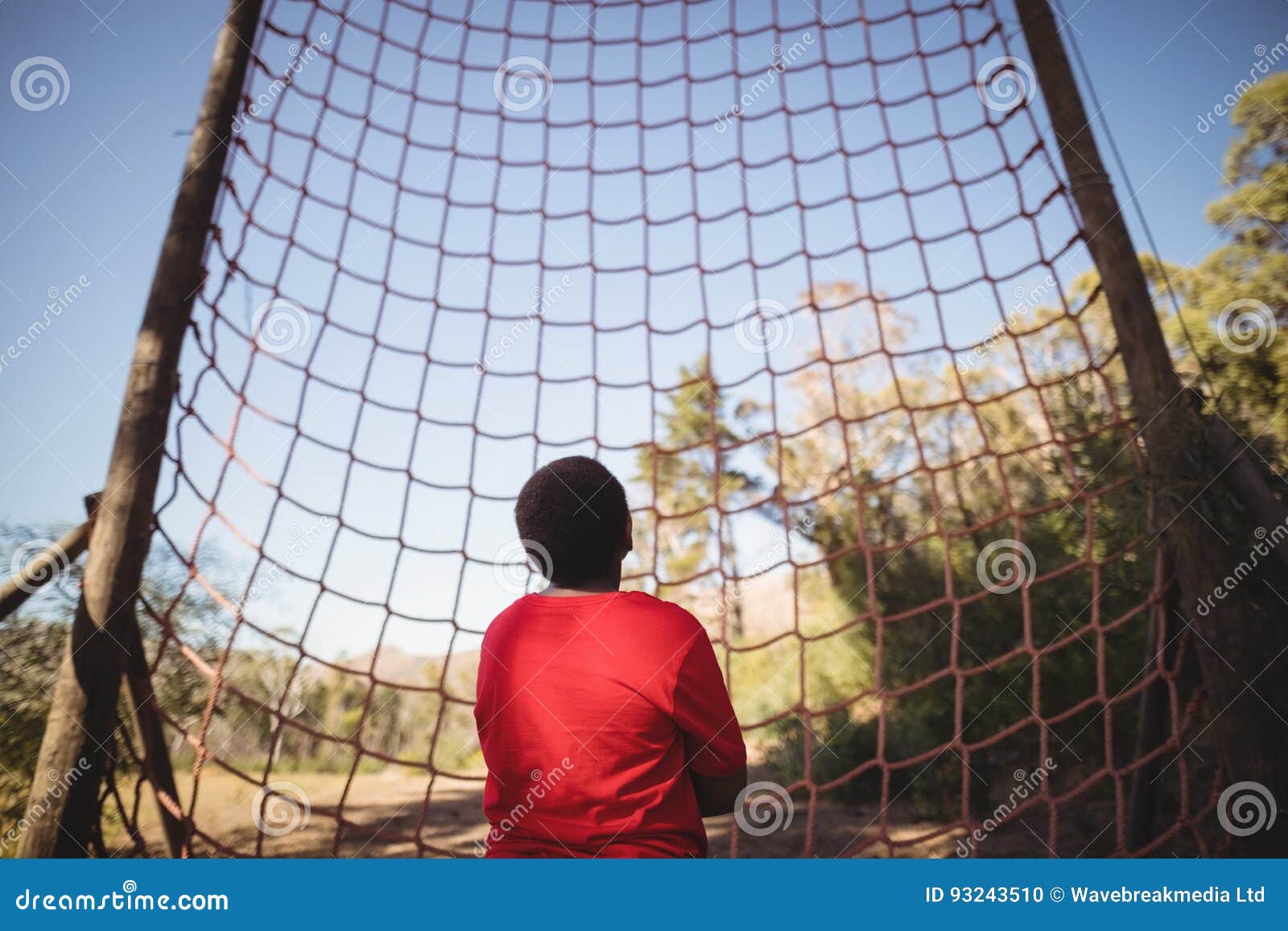 Rear View of Kid Looking at Net during Obstacle Course Stock Photo ...