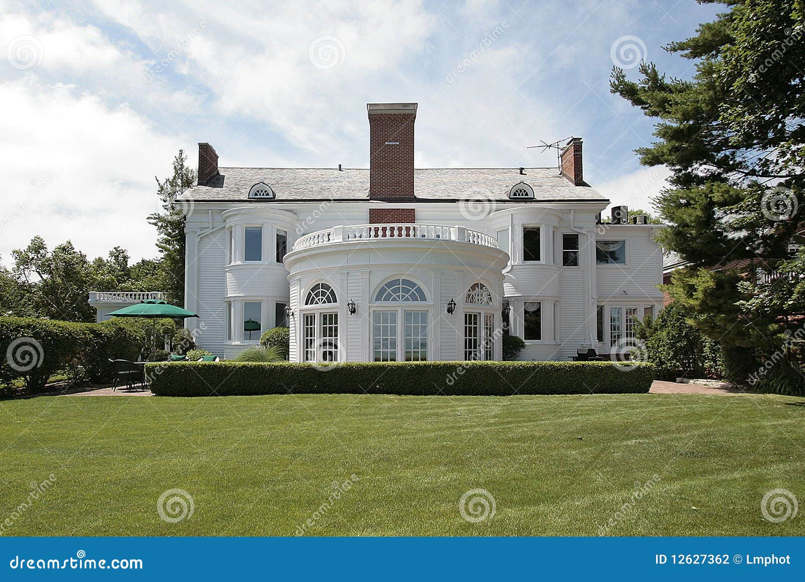 Rear view of luxury home stock photo. Image of single - 12627362