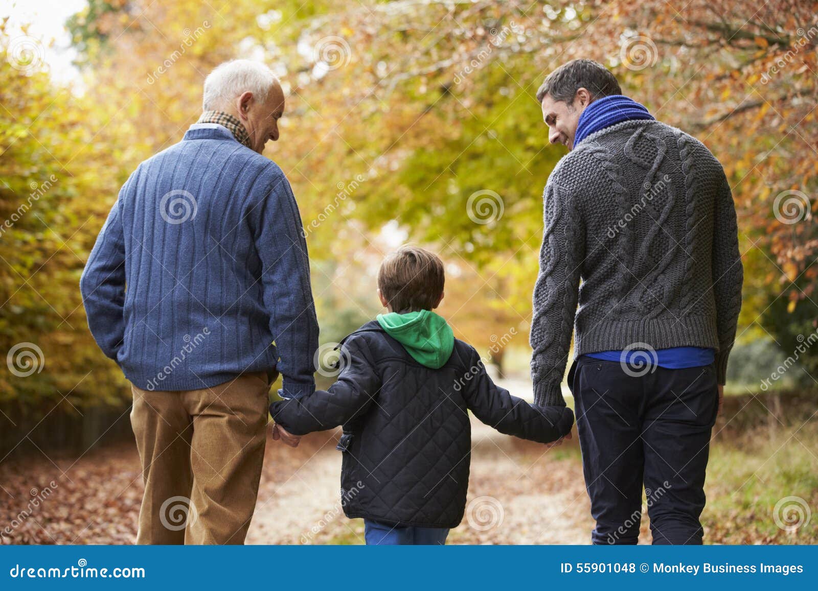 Rear View of Male Multl Generation Family Walking on Path Stock Photo ...