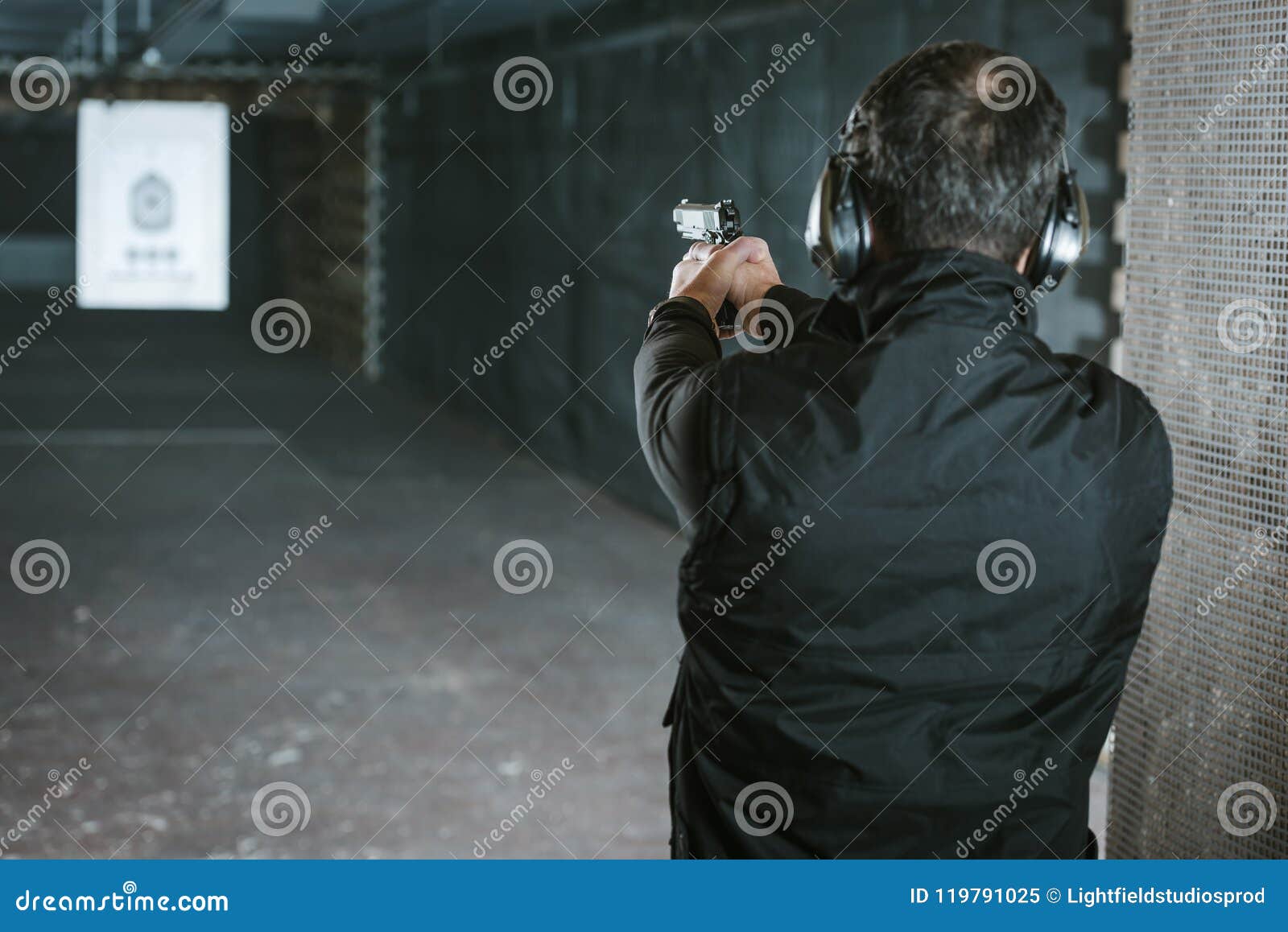 Rear View of Man Aiming Gun at Target Stock Image - Image of pistol ...