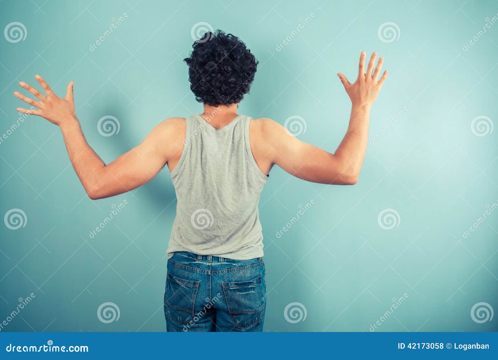 Rear View of Man with Arms Raised Stock Photo - Image of silly, adult ...