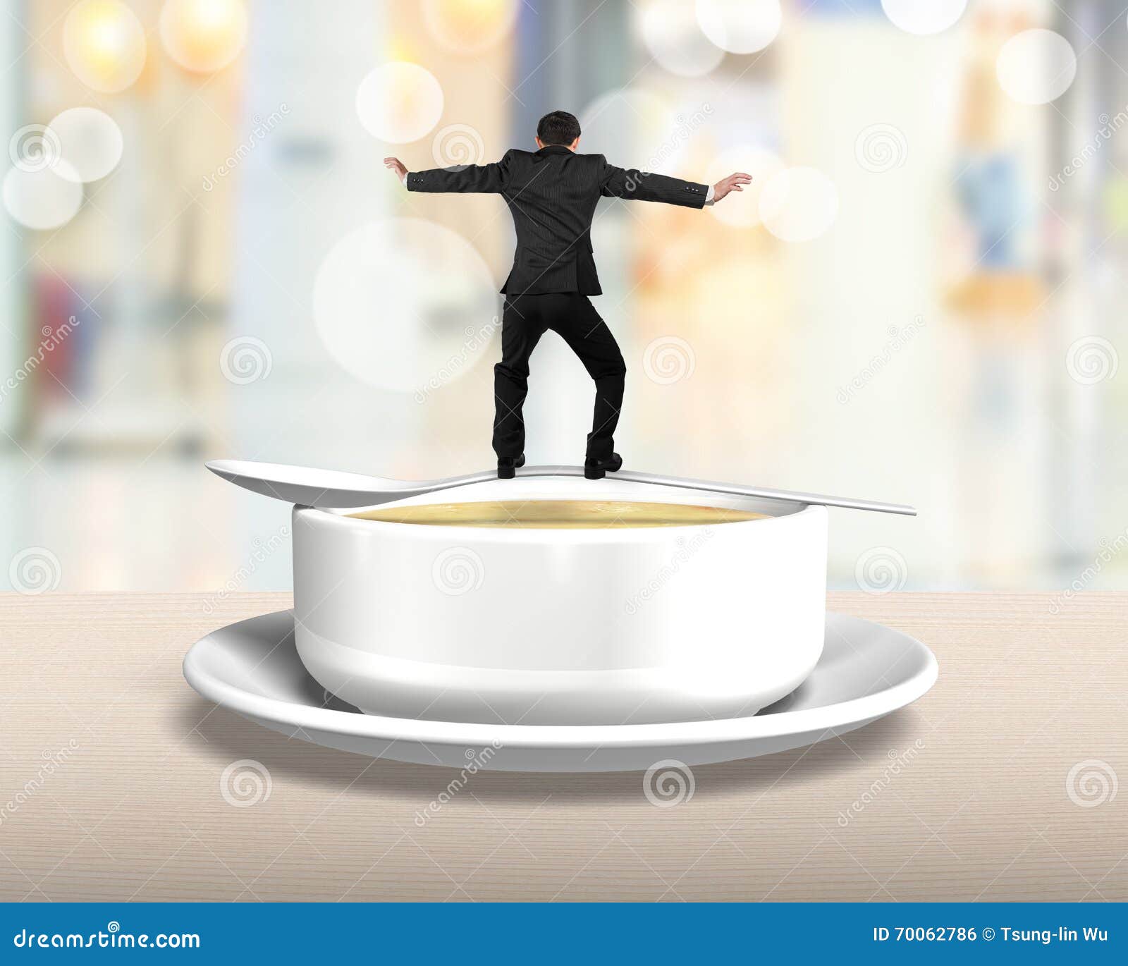 Rear View Man Balancing on Spoon with Soup Bowl Stock Photo - Image of ...