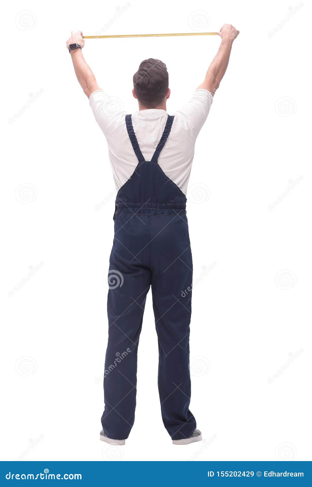 Rear View. a Man Measuring Something with a Construction Tape Measure ...