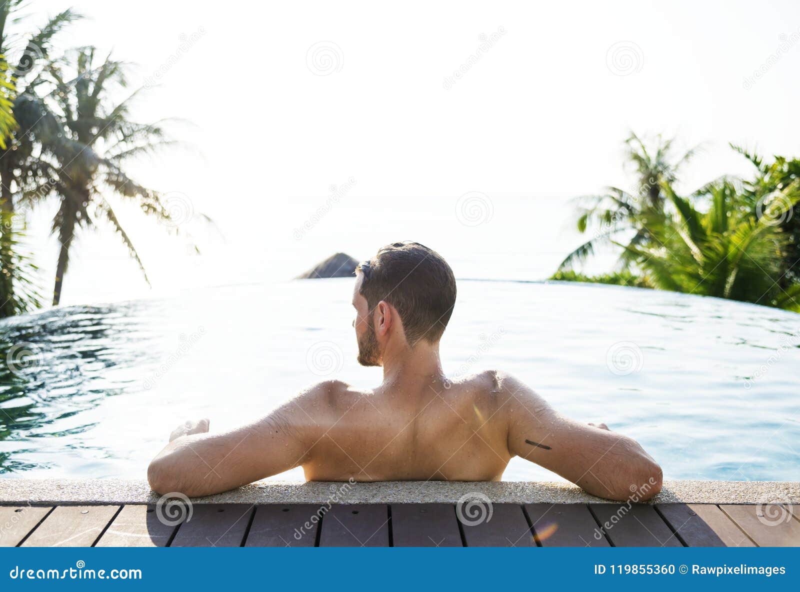 Rear View of Man Relaxing in a Pool Stock Photo - Image of holiday ...