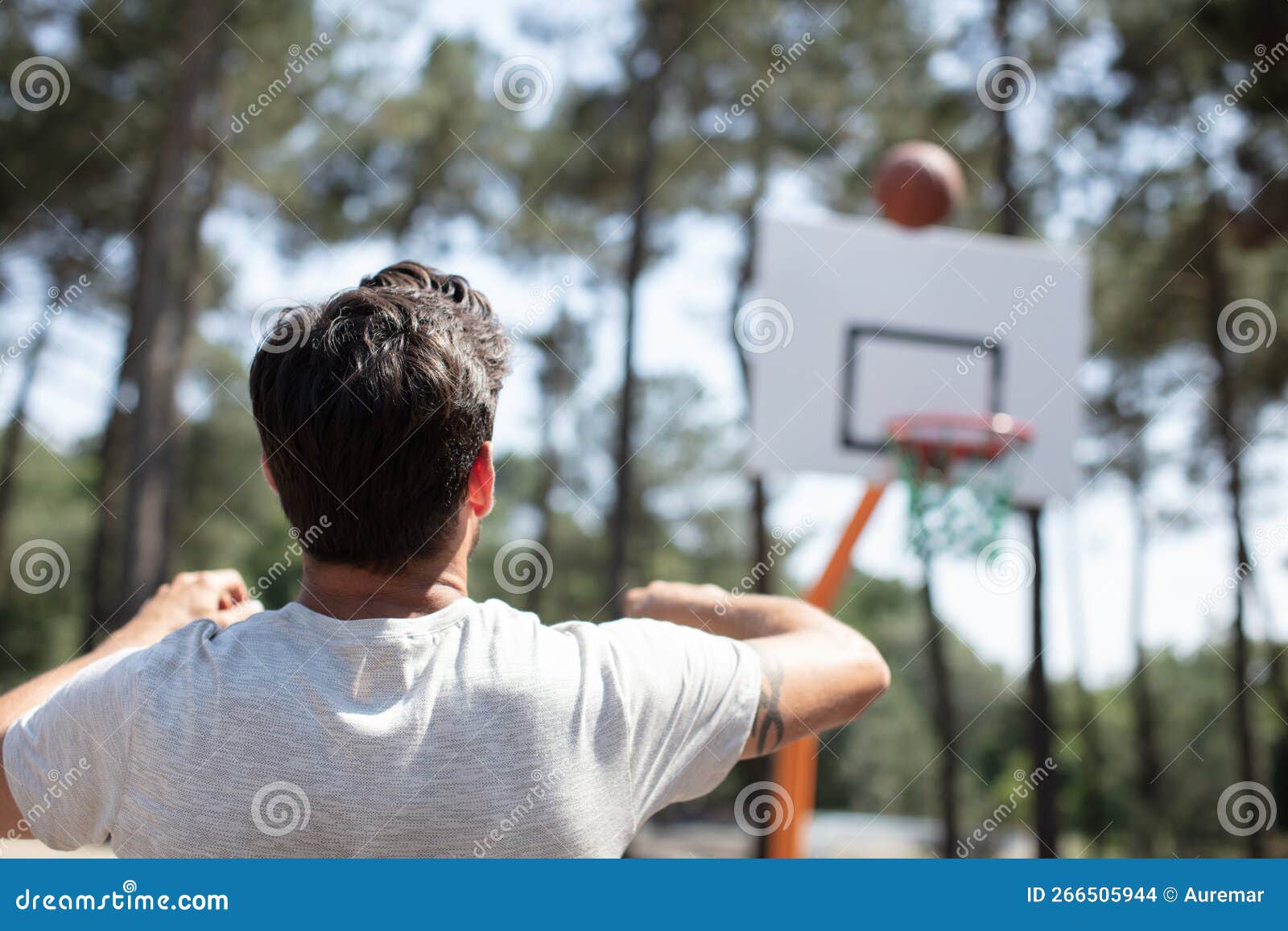 Rear View Man Shooting Basketballs Stock Photo - Image of lifestyle ...