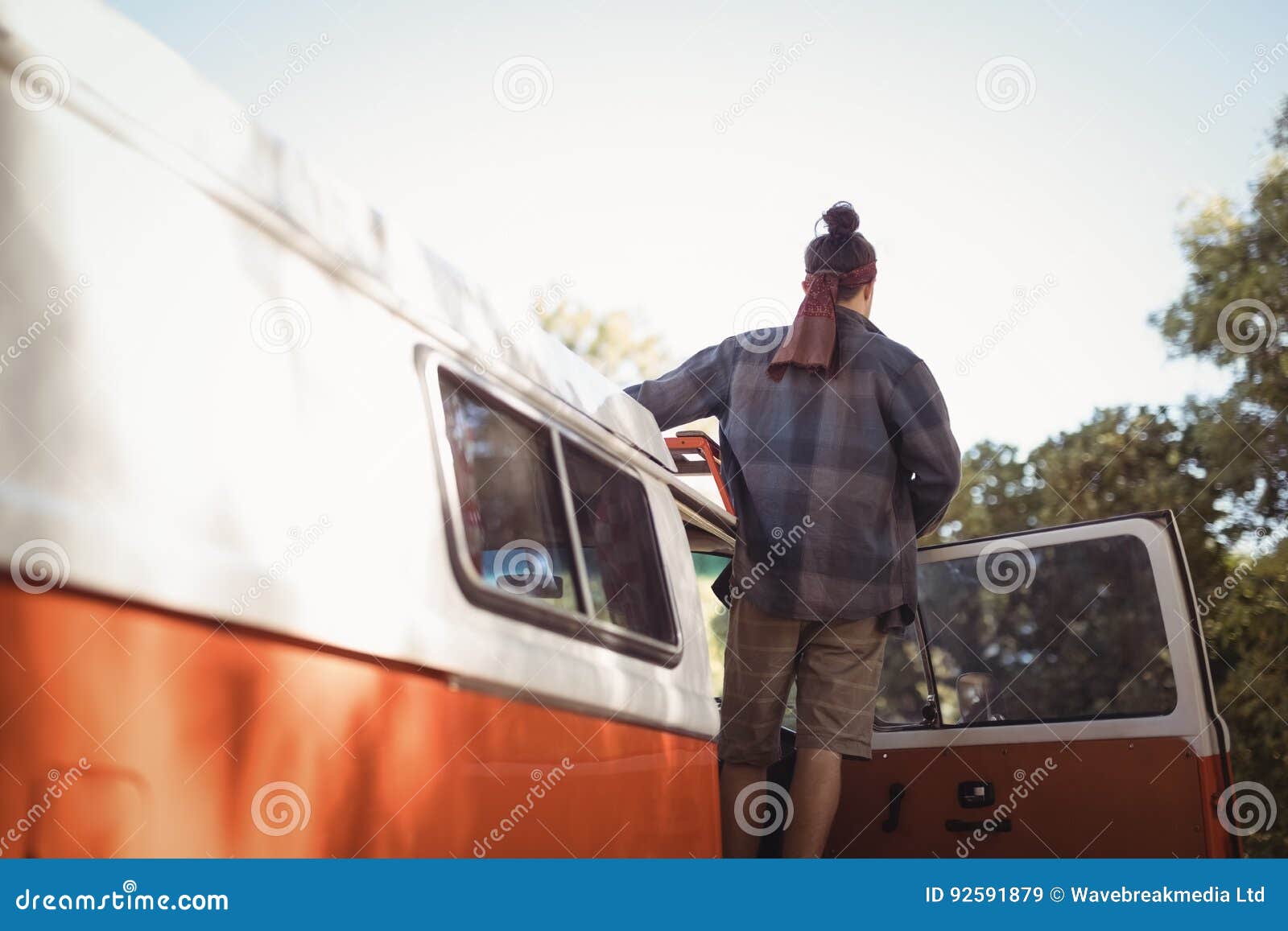 Rear View of Man Standing by Van Stock Image - Image of transparent ...