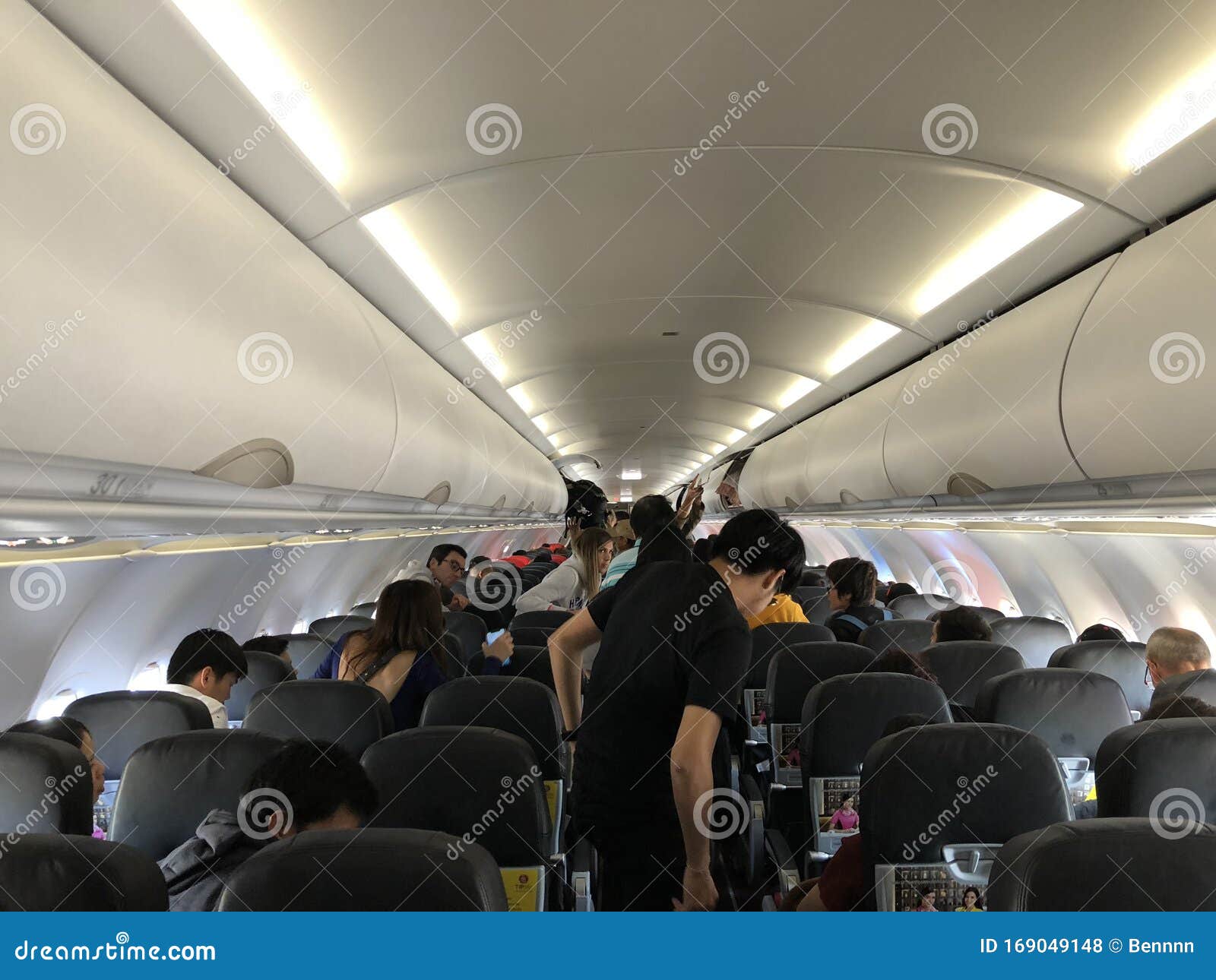 Interior of Airplane with Passengers Editorial Stock Photo - Image of ...