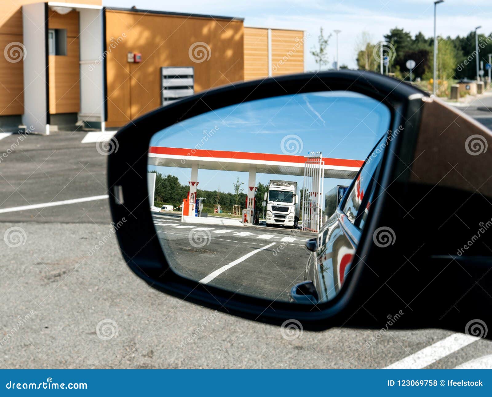 Rear View Mirror Reflection Truck Filling Gas Stock Photo - Image of ... Rear View Mirror Reflection Truck Filling Gas Stock Photo - Image of ...