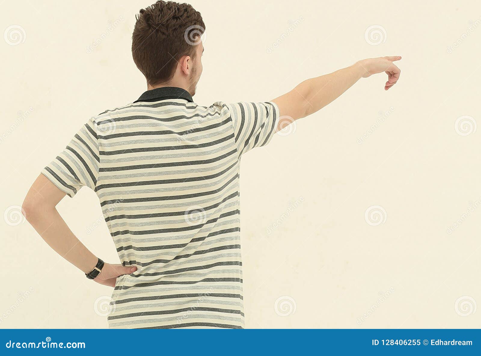 Rear View.modern Young Man Pointing Forward Stock Image - Image of ...