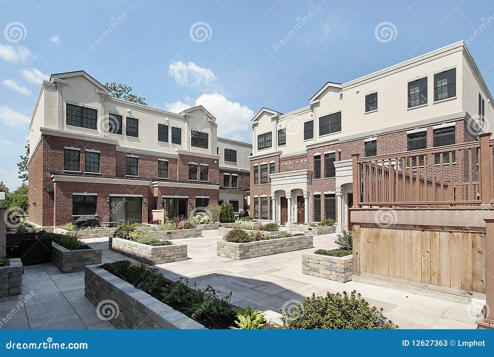 Rear View of New Construction Townhouses Stock Image - Image of grass ...