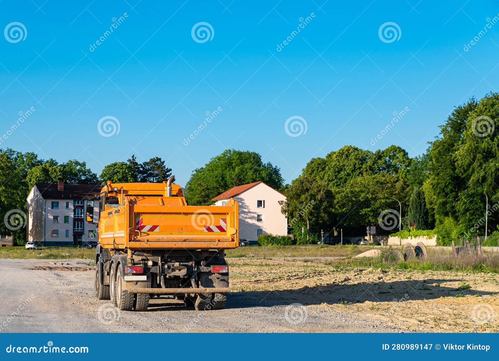 Orange Truck on an Empty Construction Site. Stock Image - Image of work ...