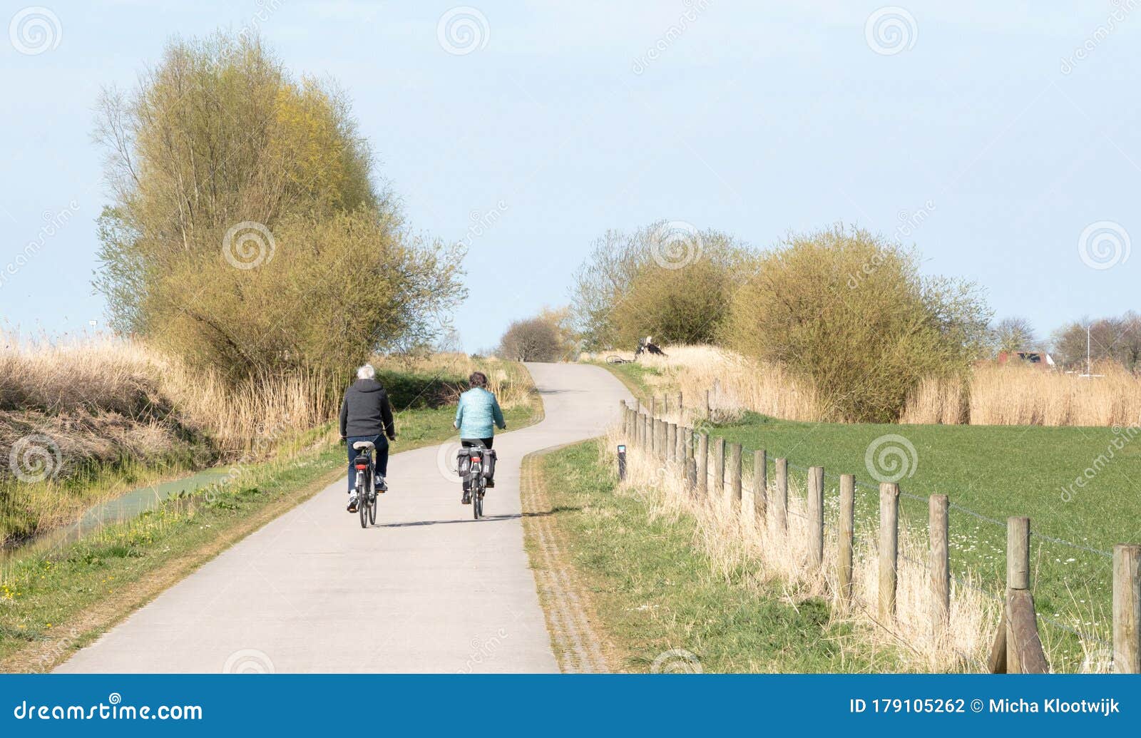Rear View of People Riding Bikes on Bicycle Path Editorial Photography ...