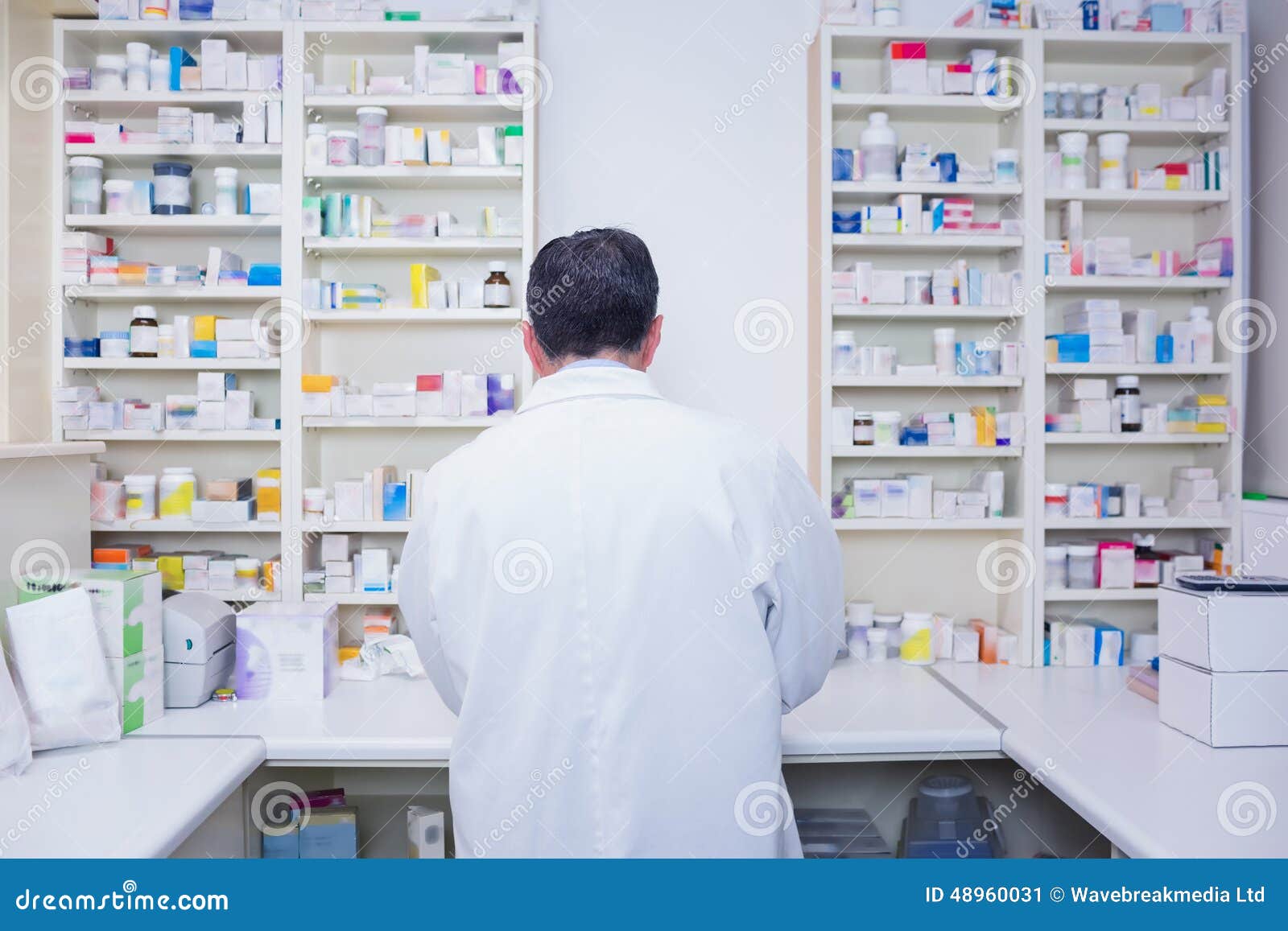 Rear View of a Pharmacist Working in Lab Coats Stock Image - Image of ...