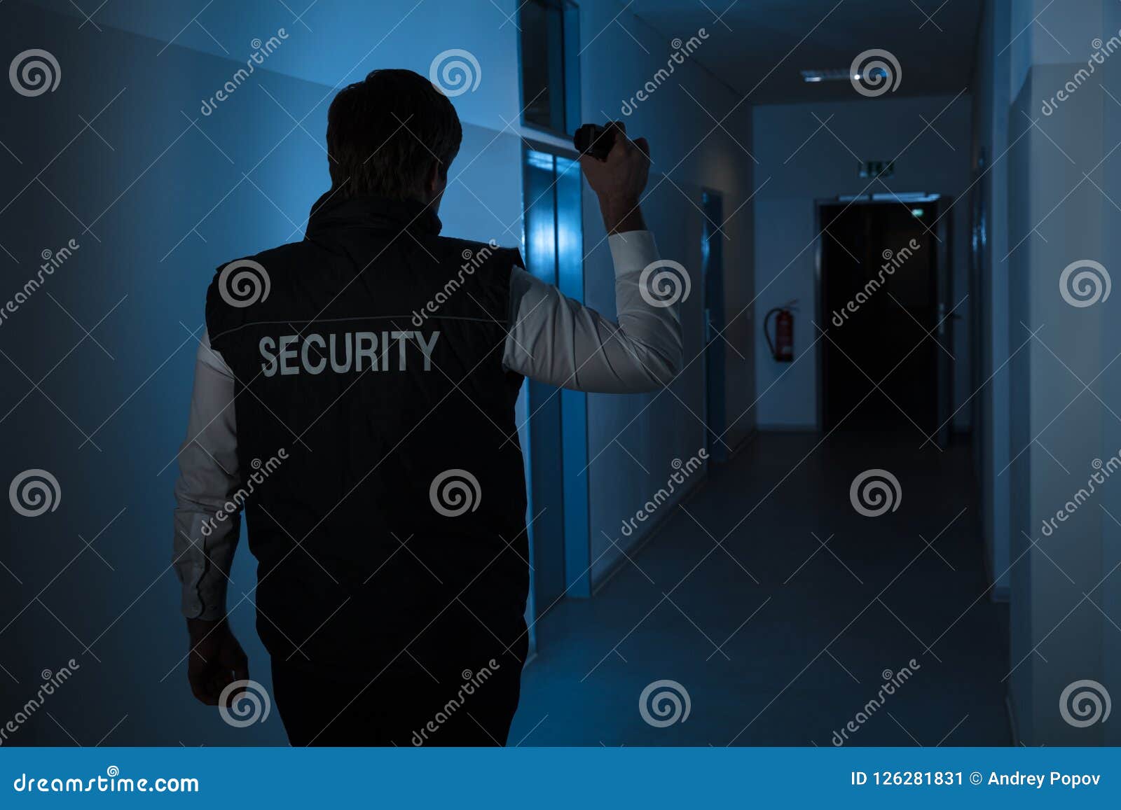 Security Guard Standing in Corridor of the Building Stock Image - Image ...