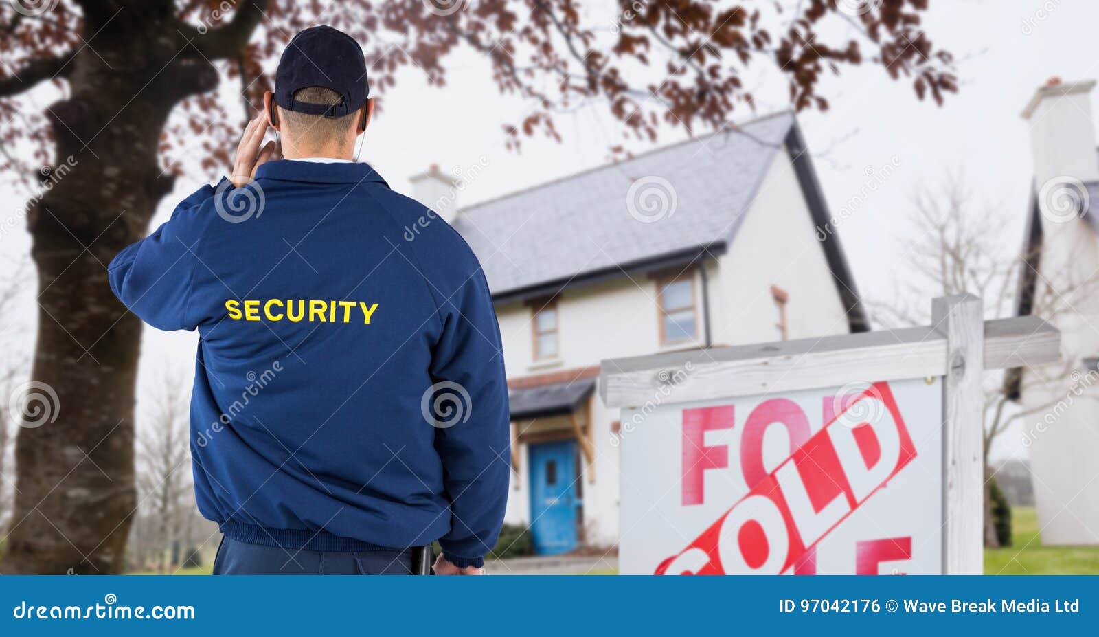 Rear View of Security Guard Standing by Sign Board with Text Stock ...