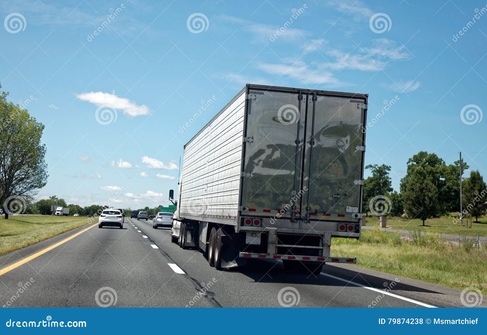 Rear View of Semi Truck on Highway Stock Photo - Image of delivering ...