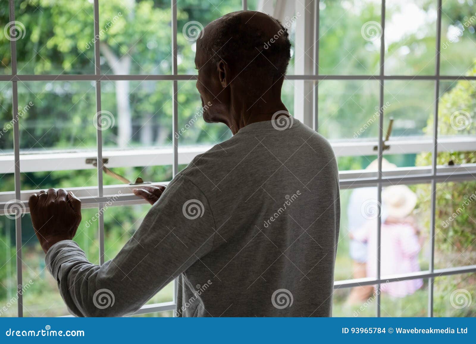Rear View of Senior Man Looking Out through Window Stock Photo - Image ...