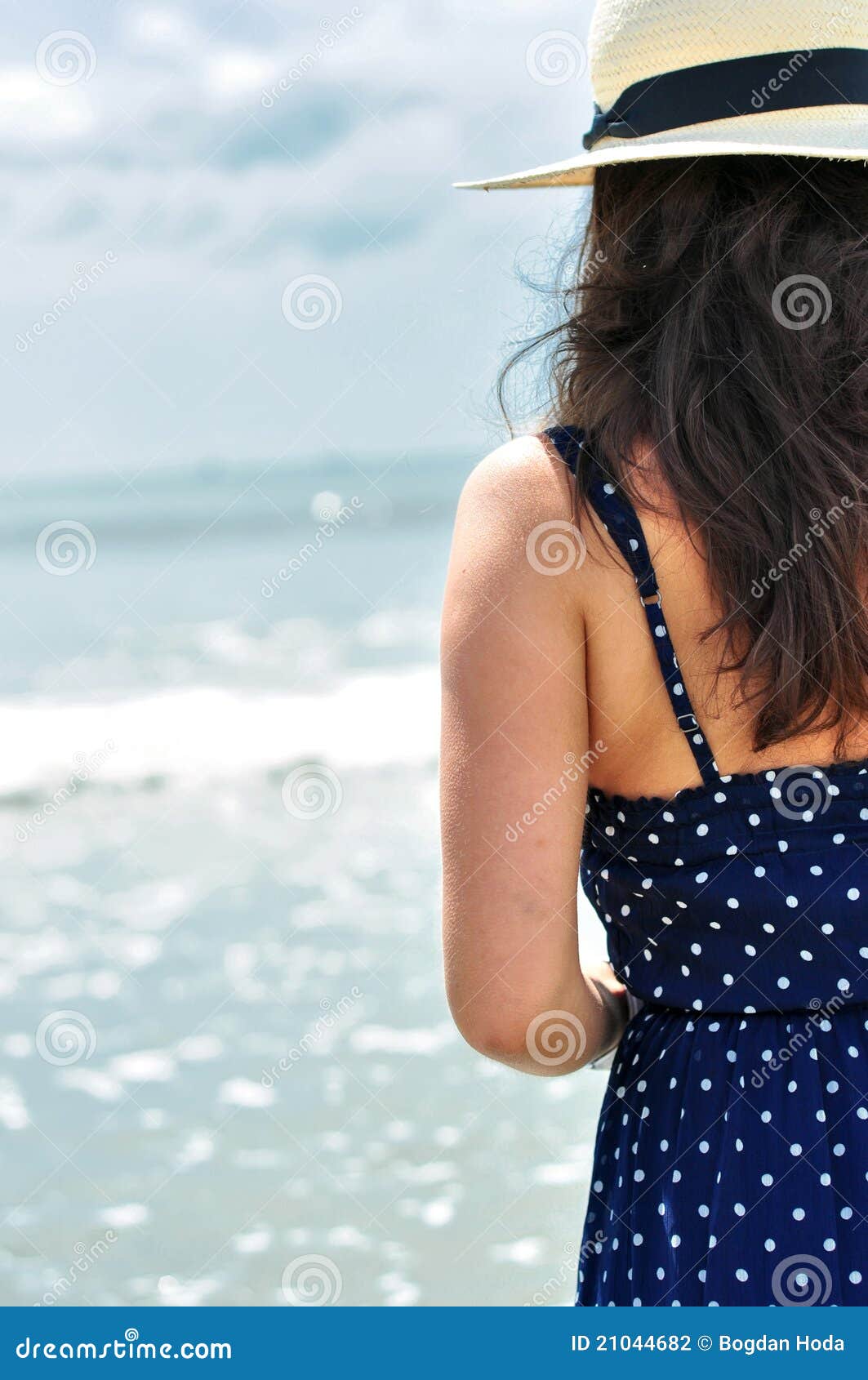 Rear View of a Brunette on the Beach Stock Photo - Image of lotion ...