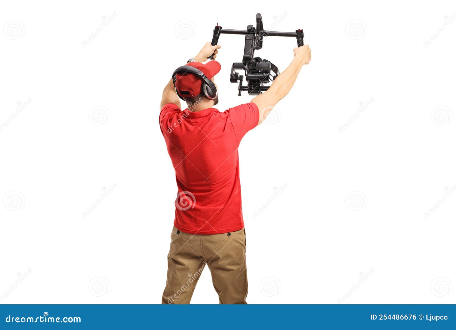 Rear View Shot of a Camera Operator Using a Camera Gimbal Stabilizer ...