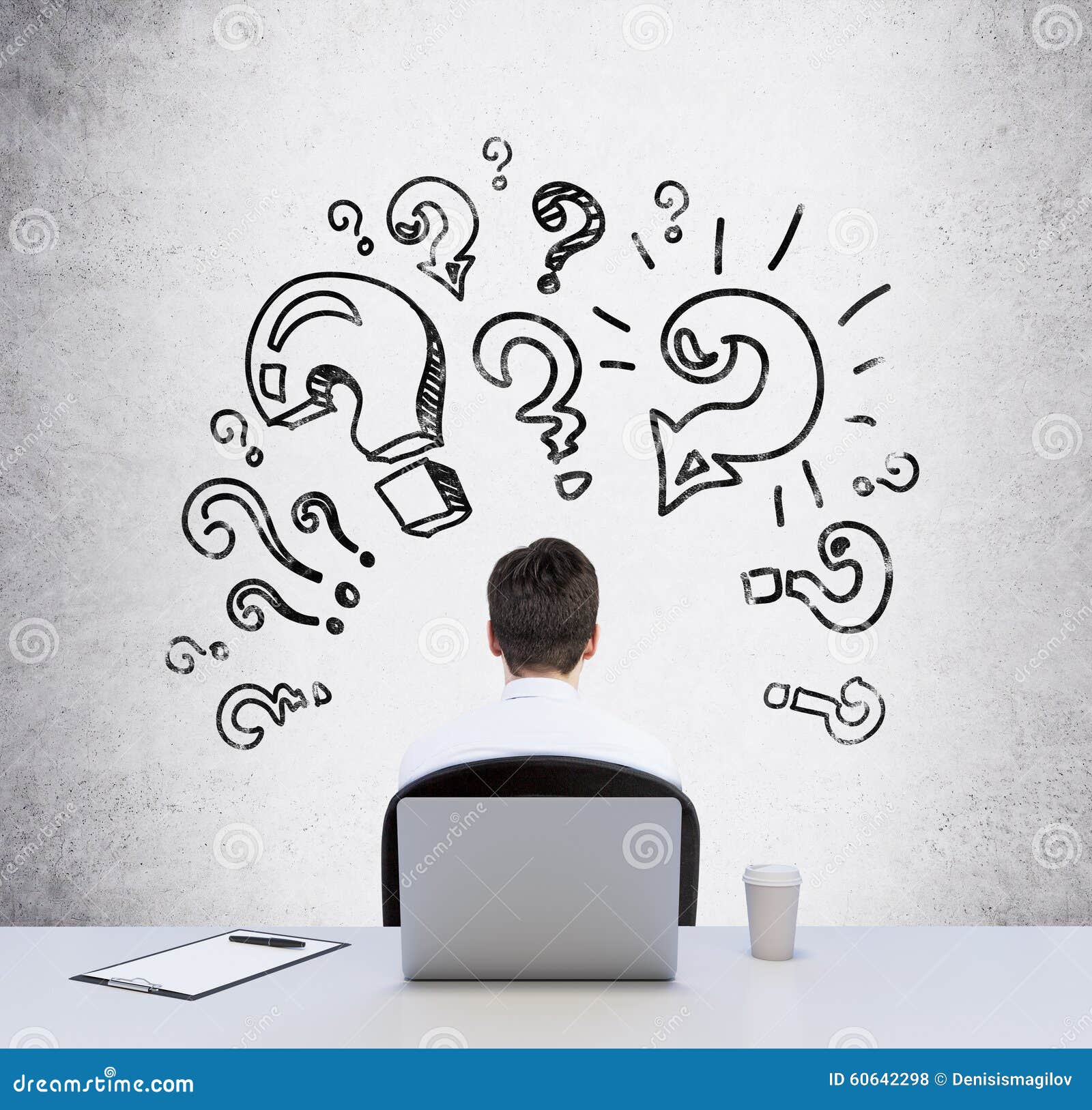 Rear View of a Sitting Person at the Working Desk Who is Looking for ...