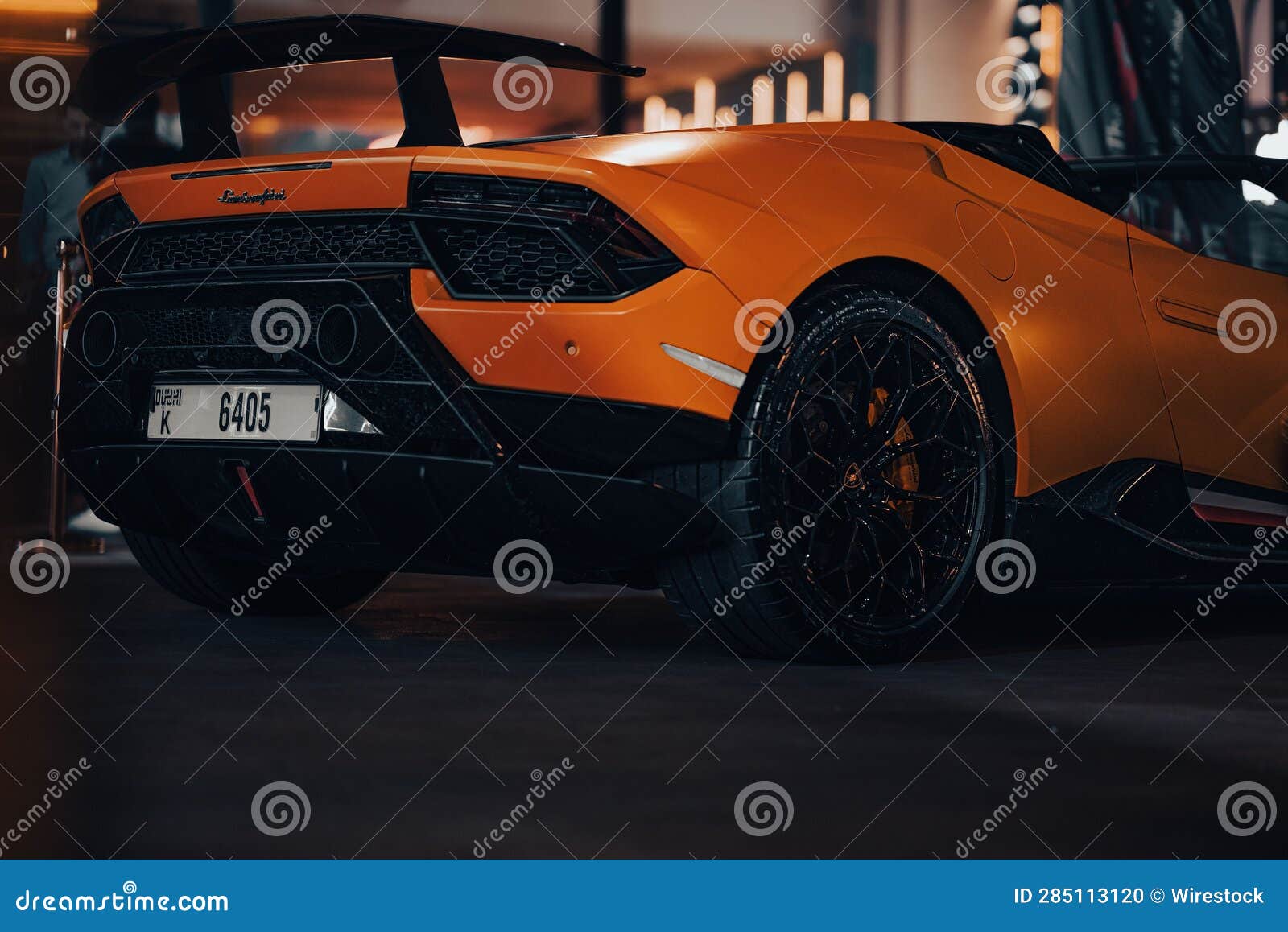 Rear View of a Sleek, Orange Lamborghini Parked Outside Editorial Image ...