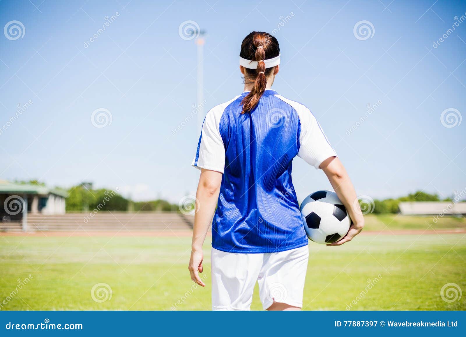 Rear View of Soccer Player Standing with a Ball Stock Image - Image of ...