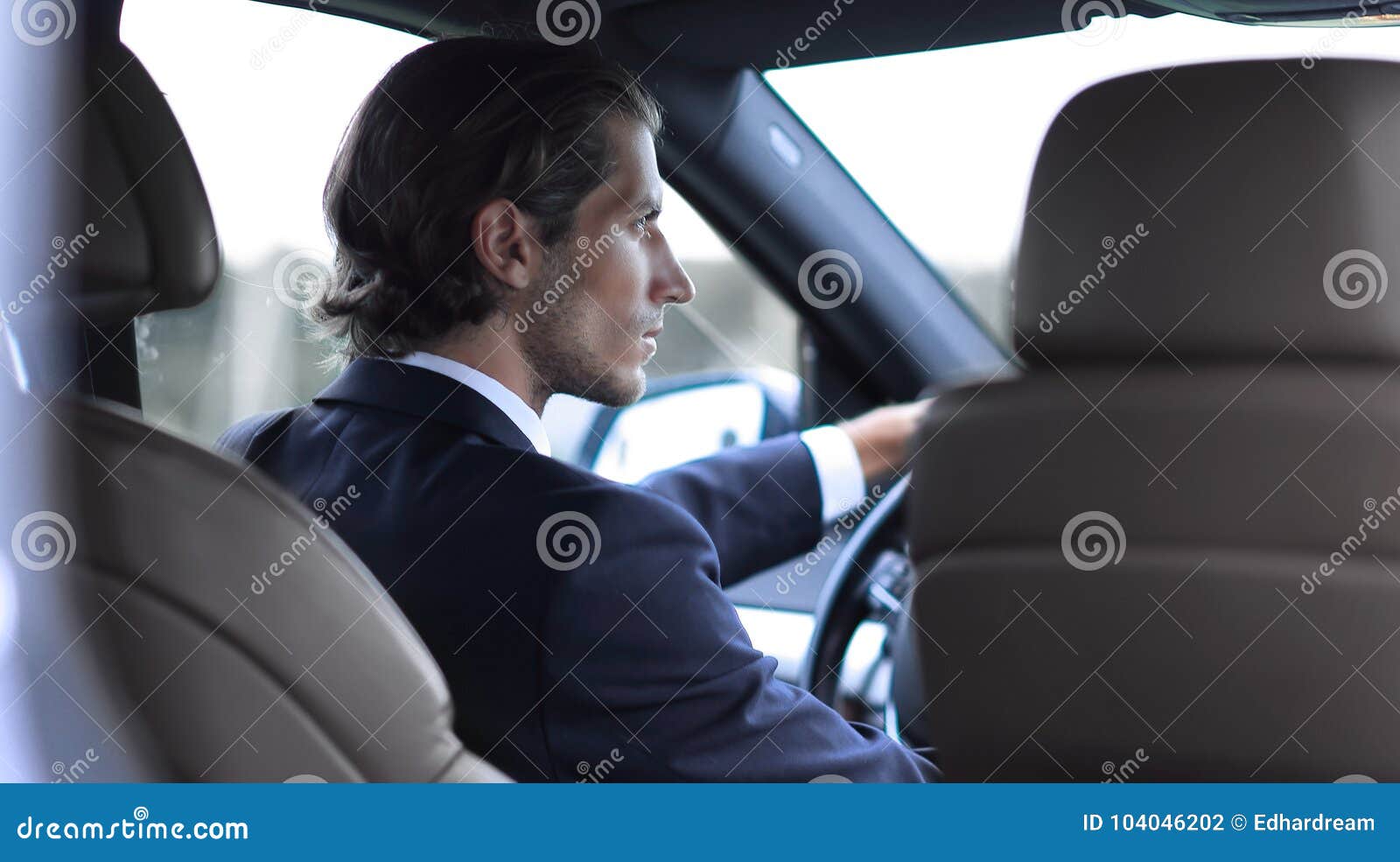 Successful Man Sitting Behind the Wheel of a Car Stock Photo - Image of ...