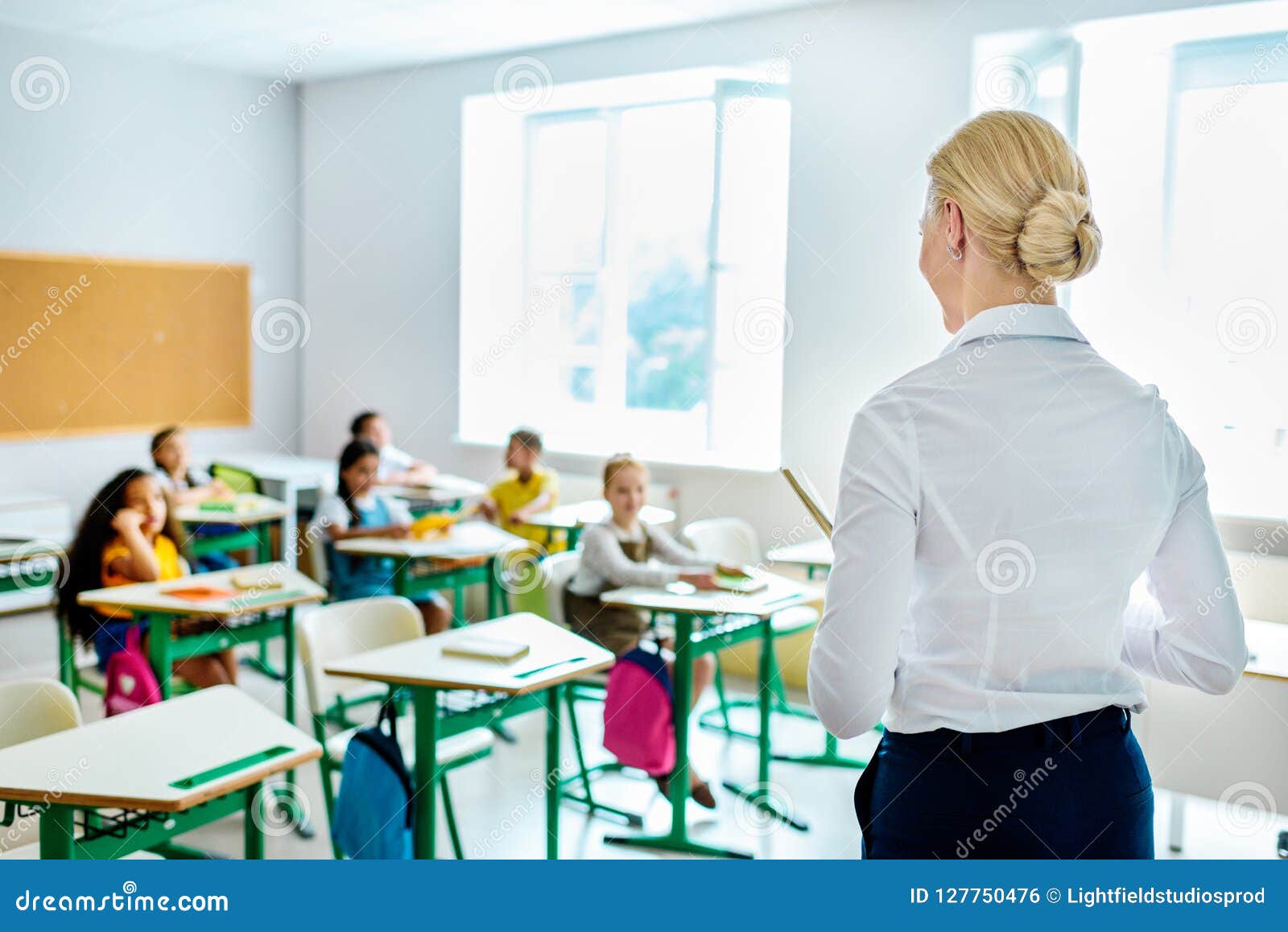 Rear View of Teacher Looking at Children Stock Photo - Image of class ...