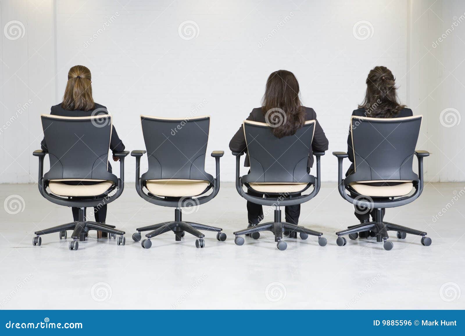 Rear View of Three Business Women Sitting in a Lin Stock Photo - Image ...