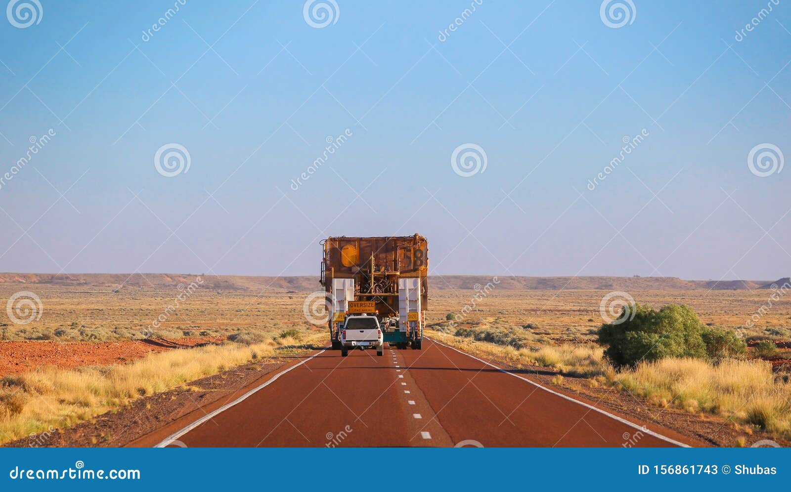 Rear View. Truck Oversize Rides on Road. Load Ahead Stock Image - Image ...