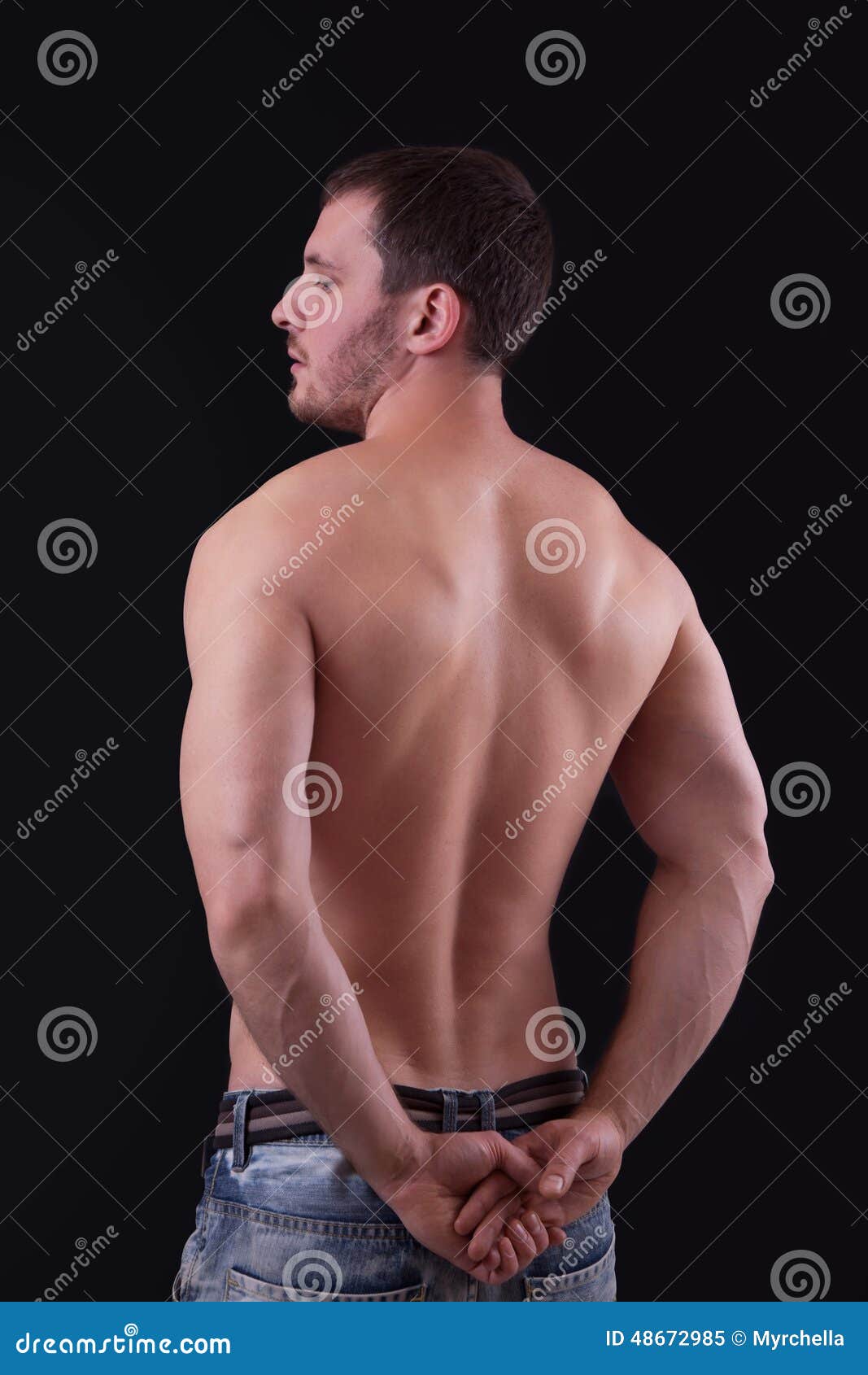 Rear View of a Well-built Young Man Stock Image - Image of arms, pose ...