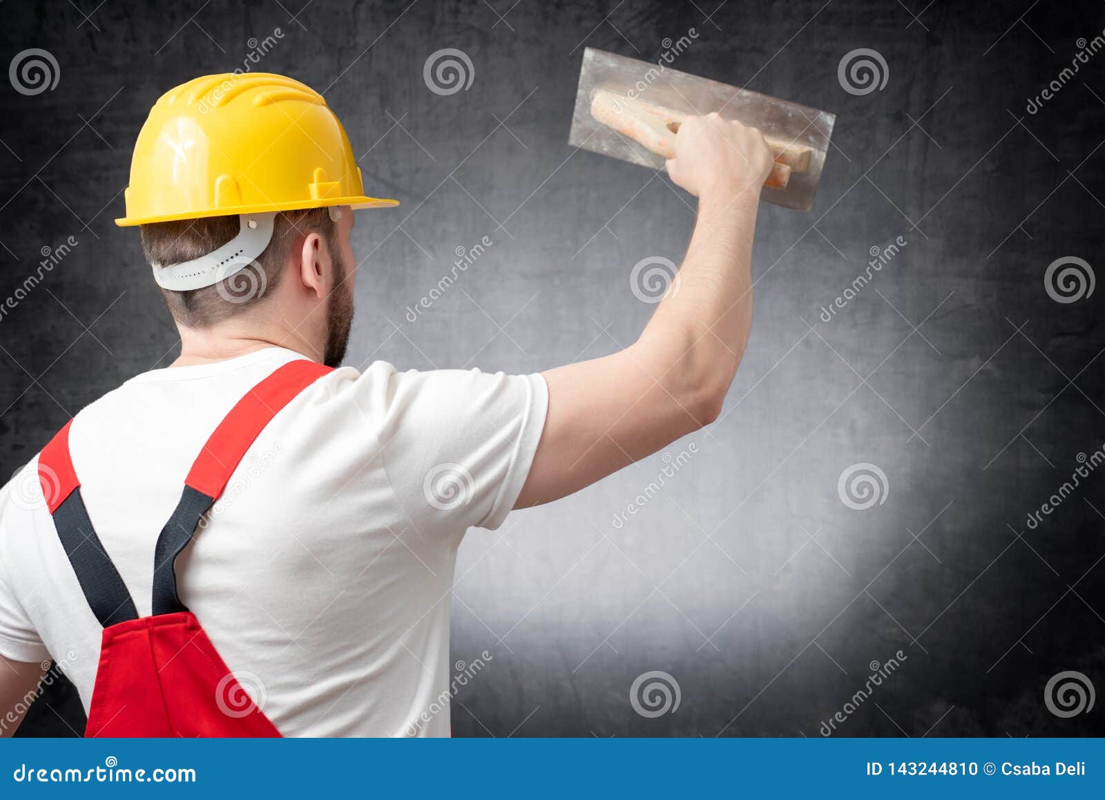 Man Plastering A Wall Using Floating Rule To Check The Flatness Stock ...
