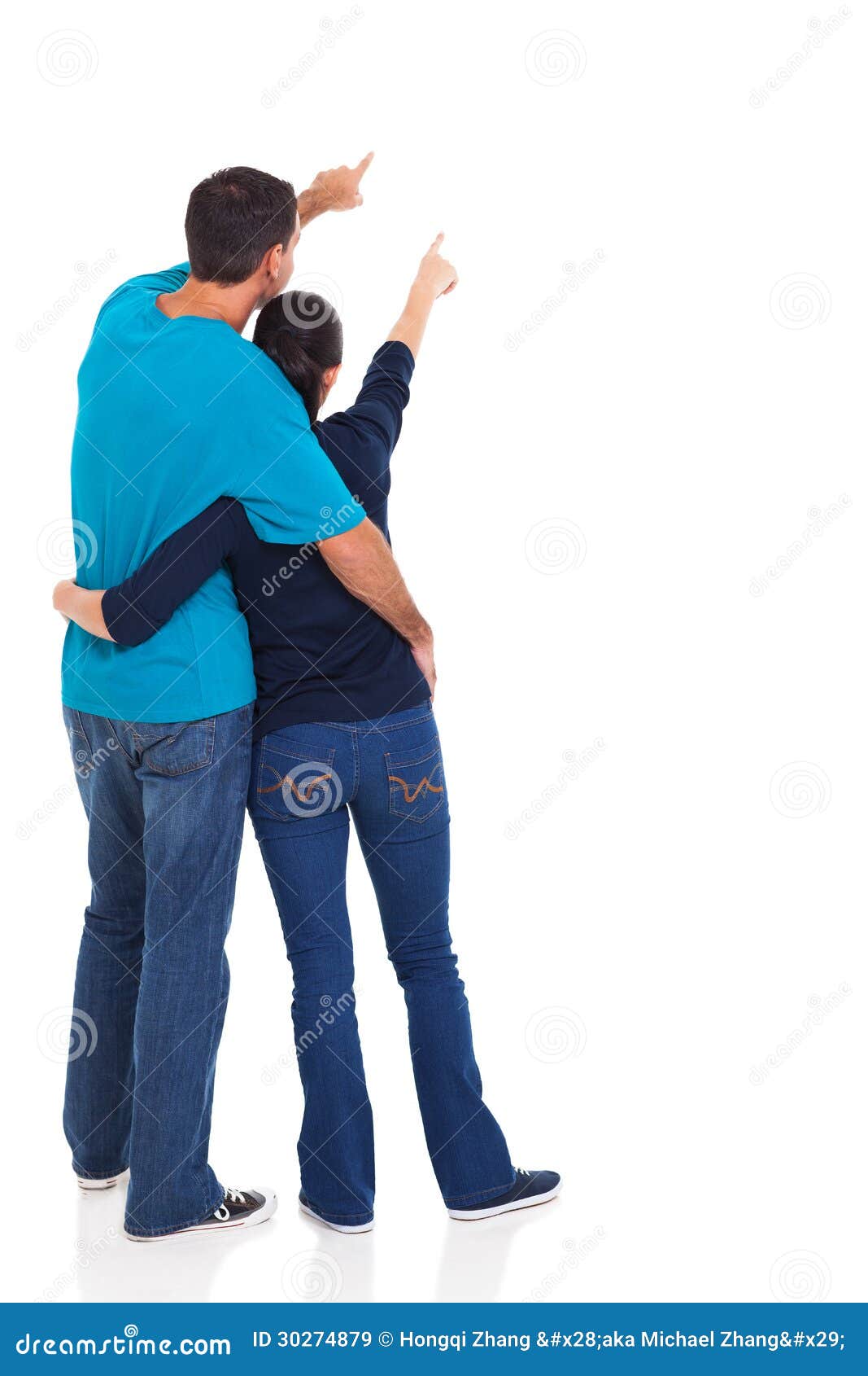 Young couple pointing stock image. Image of hugging, isolated - 30274879