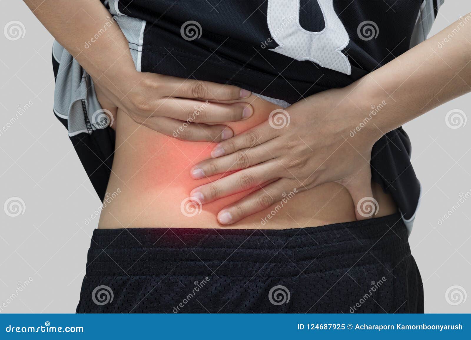 Rear View - a Young Man Holding His Back in Pain Stock Image - Image of ...