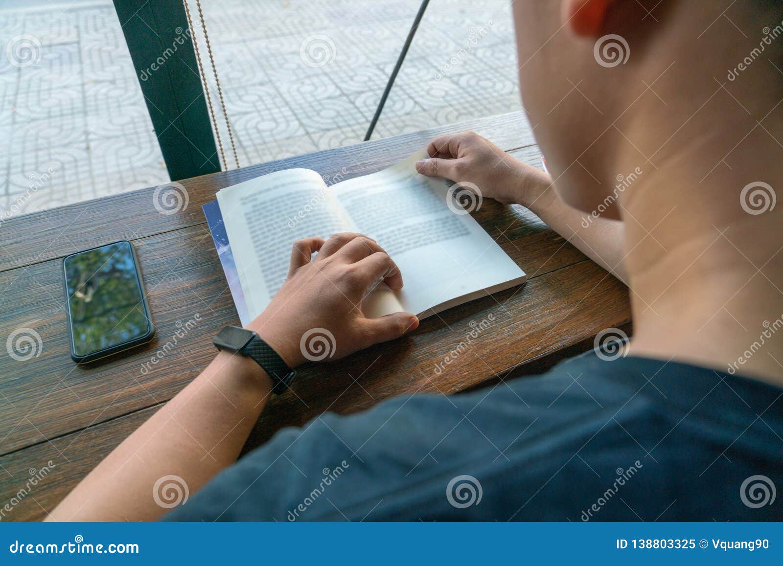 Rear View of Young Man Read a Book Stock Image - Image of sitting ...
