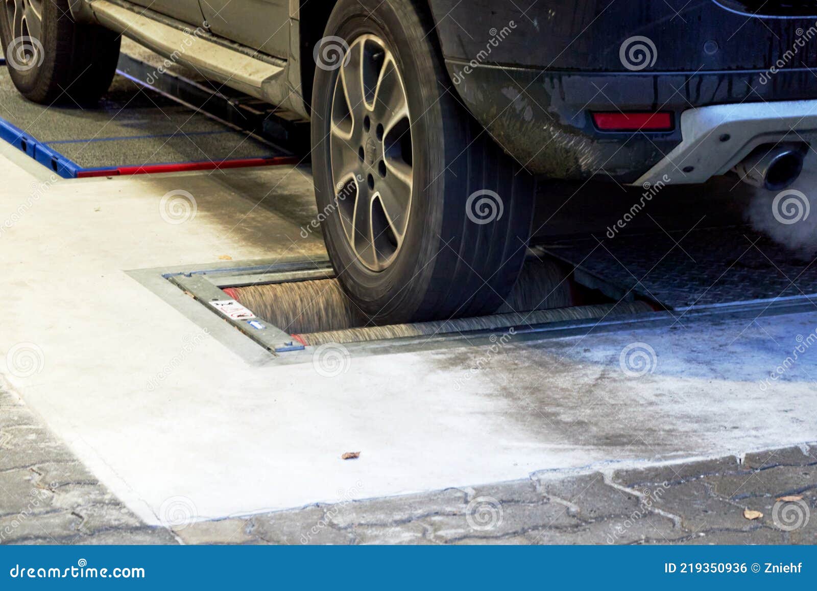 Rear Wheel of an Old Car during the Technical Inspection on the Brake ...
