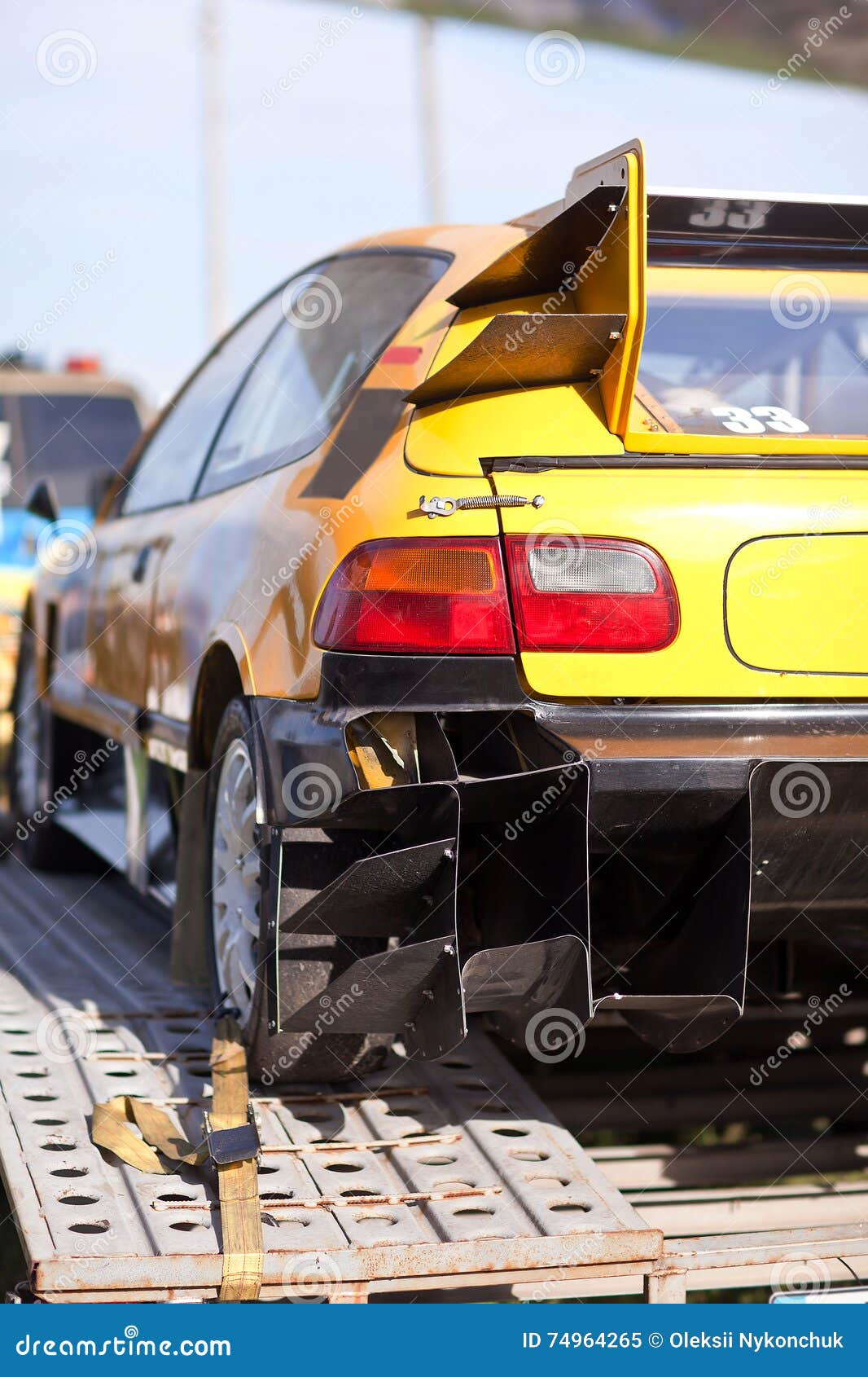 Rearlights of Yellow Sport Car with Black Diffuser Stock Image - Image ...