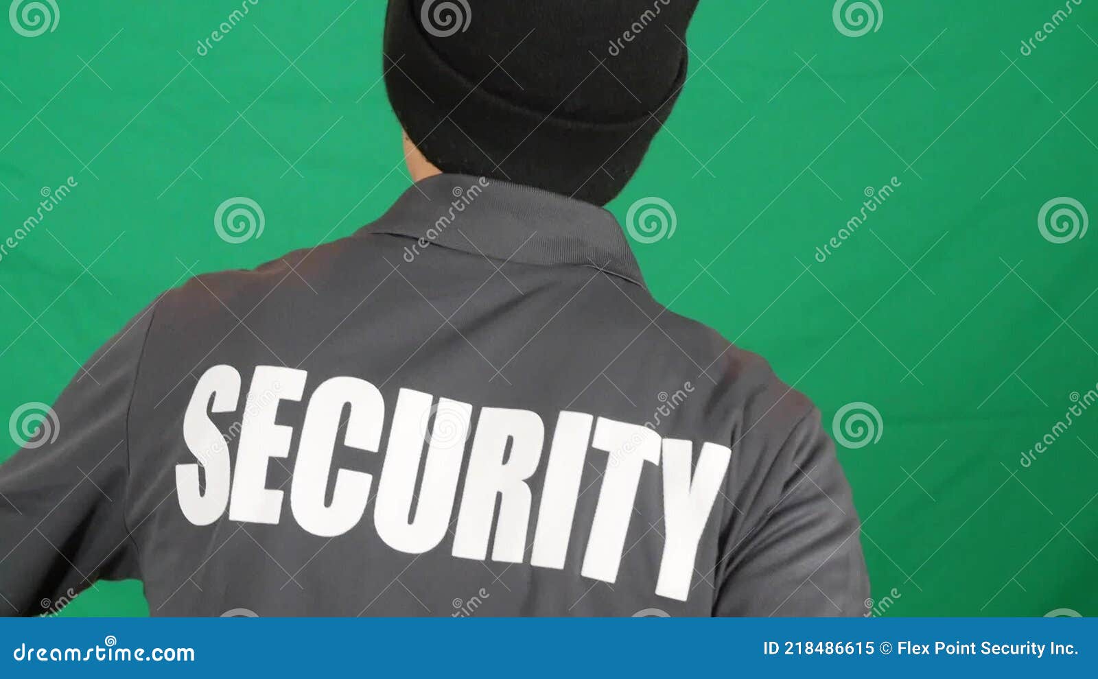 Security Guard Standing on the Green Background. Stock Video - Video of ...