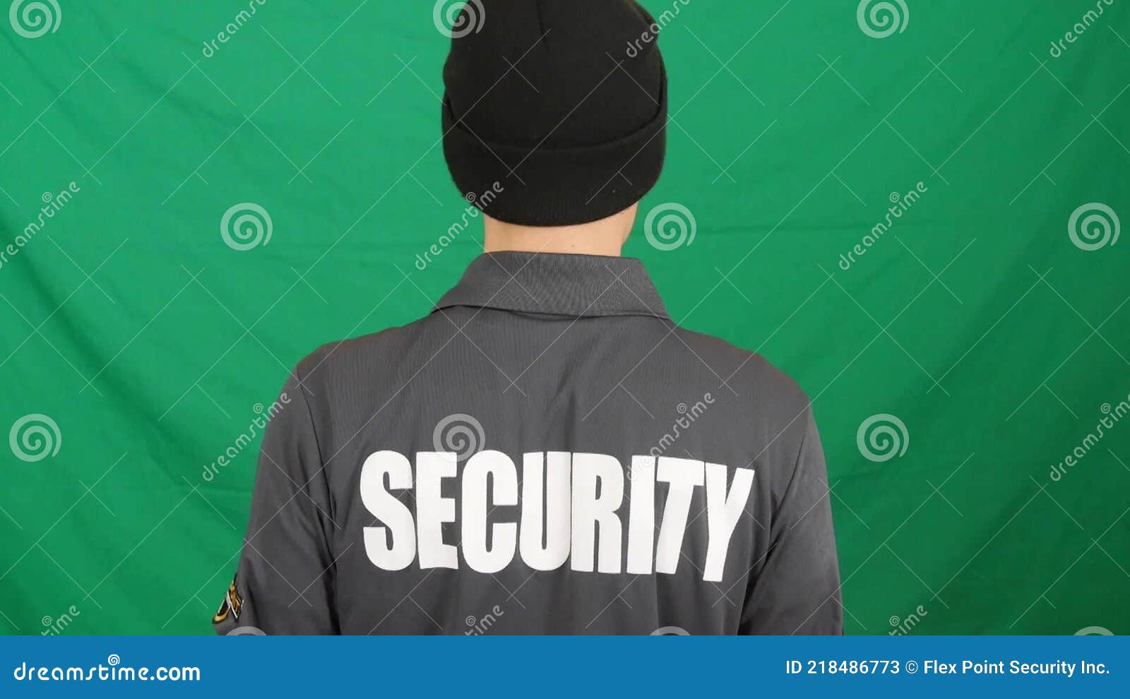 Security Guard Standing on the Green Background. Stock Video - Video of ...