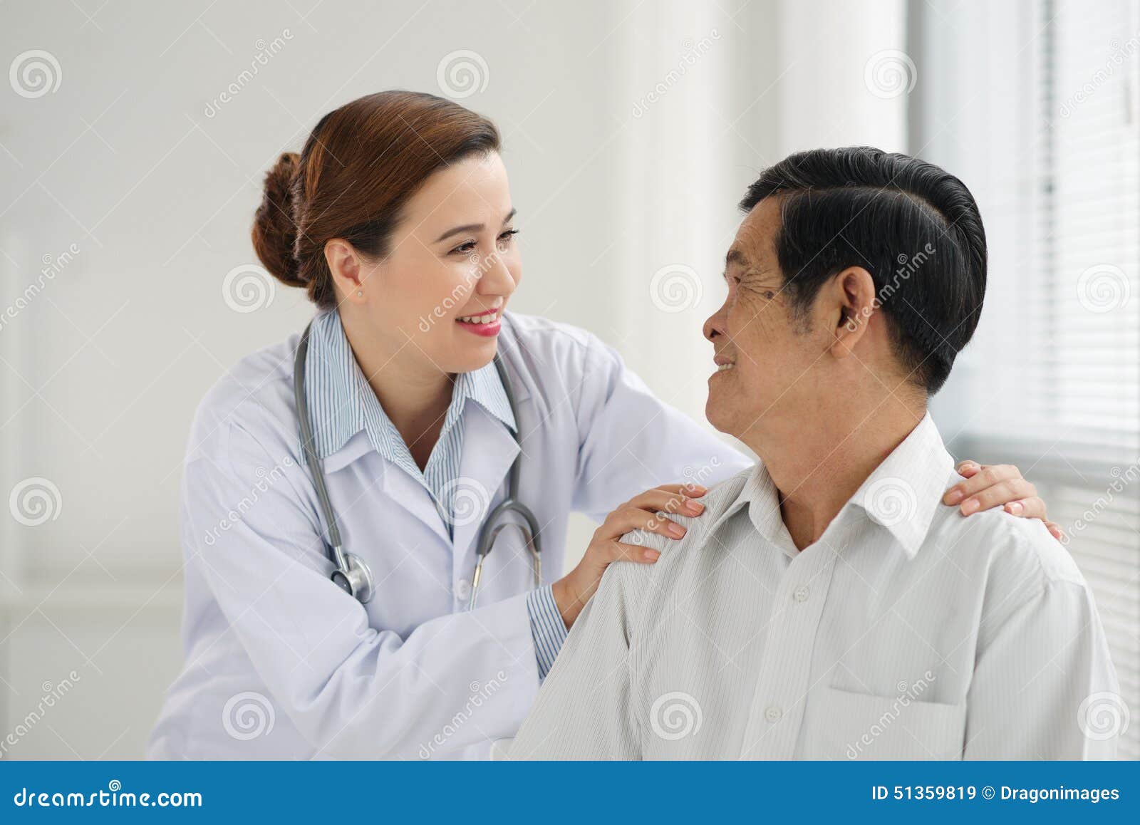 Reassuring a patient stock image. Image of portrait, caregiver - 51359819