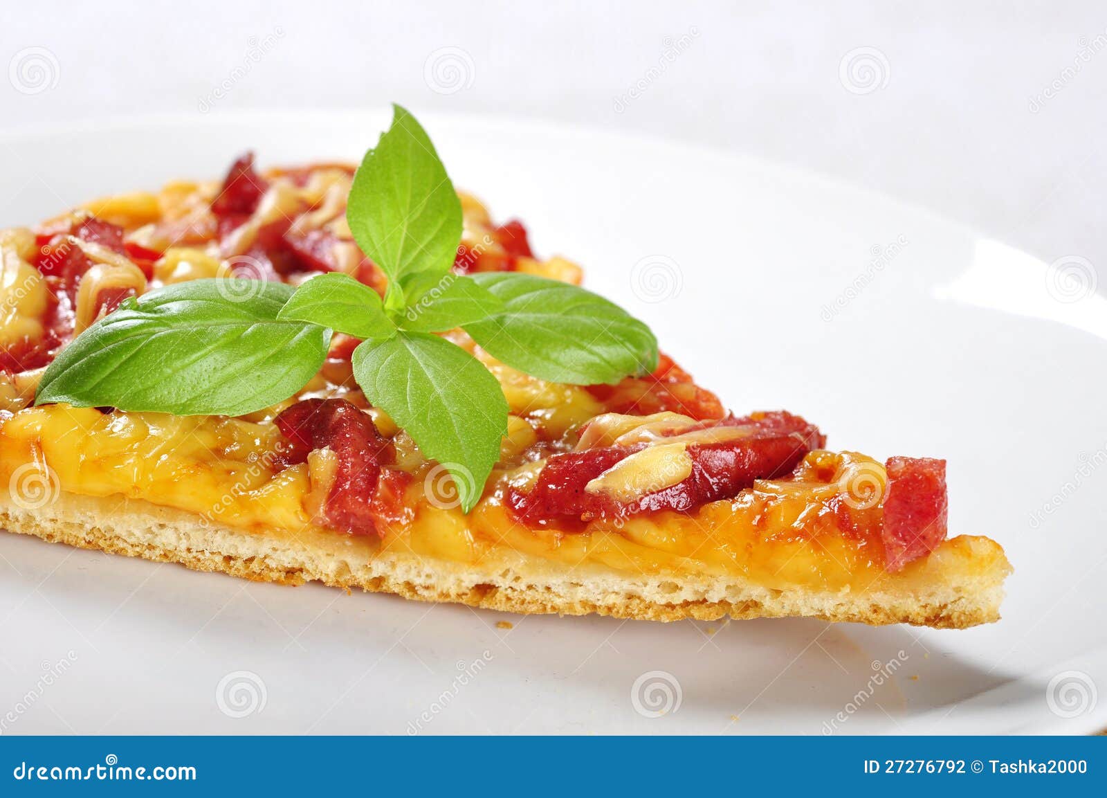 Rebanada de pizza foto de archivo. Imagen de sabroso - 27276792