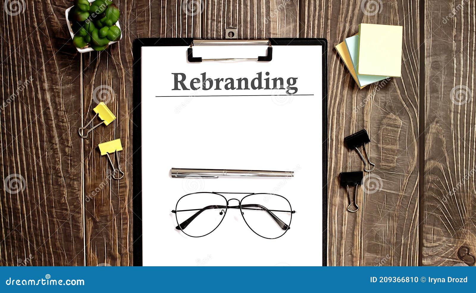 Rebranding Text Form on a Wooden Table with Office Tips Stock Photo ...