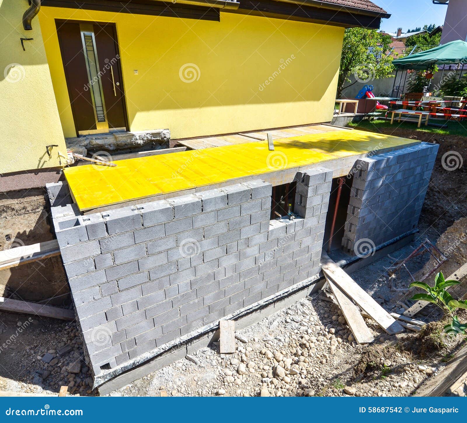 Rebuilding a family house stock photo. Image of compacting - 58687542