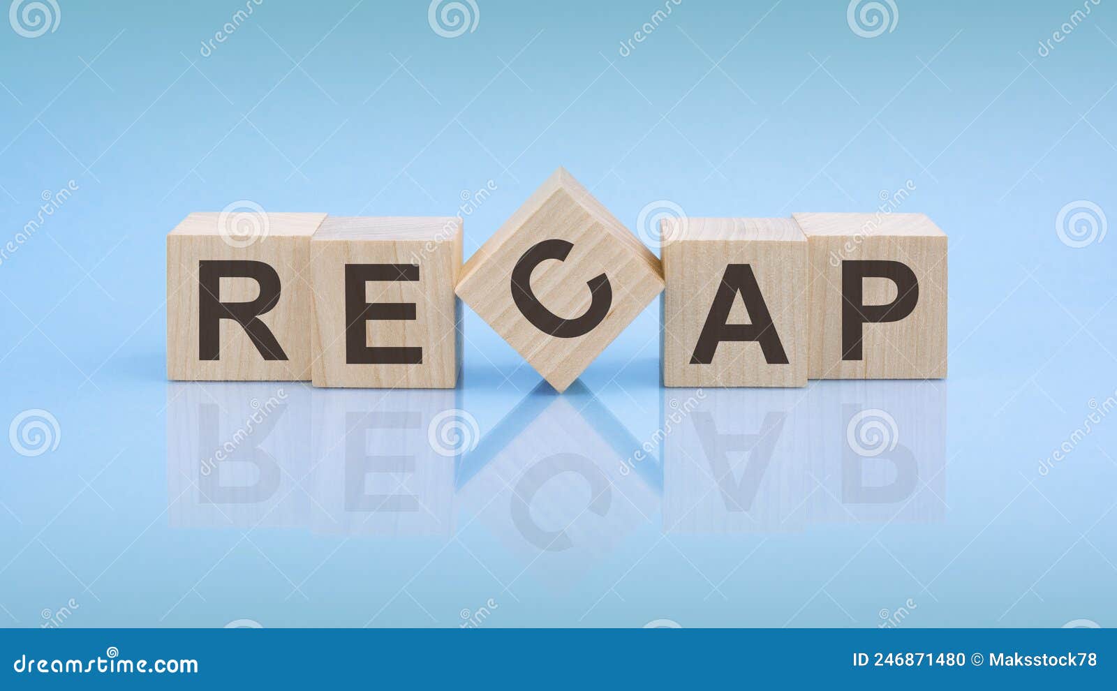 RECAP - Word is Written on Wooden Cubes on a Bright Blue Background ...