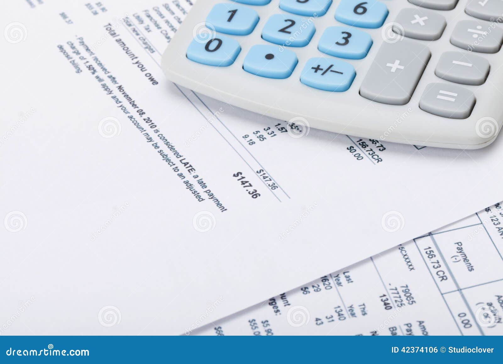 Receipt next to calculator stock photo. Image of business - 42374106