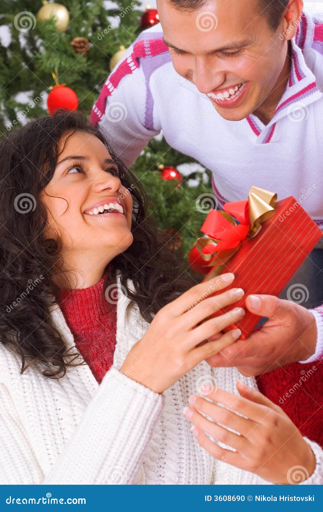 Receiving Christmas Present Stock Photo - Image of celebration, gold ...